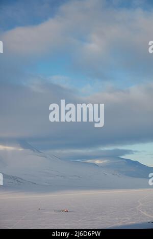 Lonely house in the middle of a snow-covered field top view Stock Photo ...