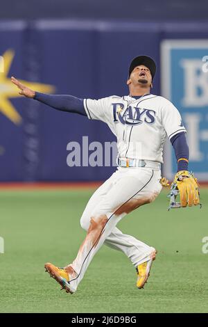 Tampa Bay Rays pitcher Joe Record juggles baseballs during the team's ...
