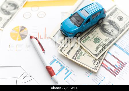 small car model and sheets drawings Stock Photo - Alamy