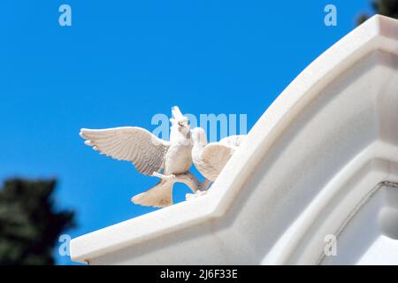 two white doves on grave headstone in seville cemetery cementerio de ...