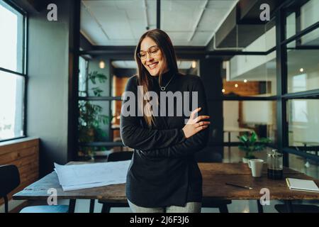 Young moder business woman, office lady holding mug with coffee tea and ...