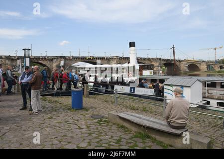 Dresden/Sachsen/Germany/30 April 2022/.Tourists and vacaner boarding on ...