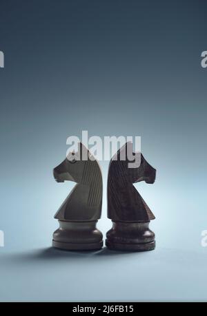 Knights opposing each other: chess game and competition concept Stock ...