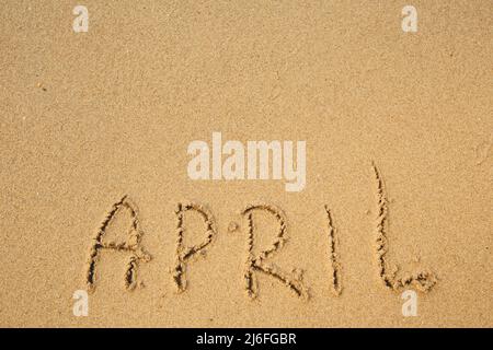 April - drawing handwritten on the sea beach sand Stock Photo - Alamy