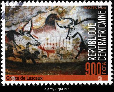 Prehistoric depictions of a horse from Lascaux caves on stamp Stock ...