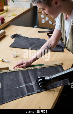 Hand bending a ruler Stock Photo - Alamy