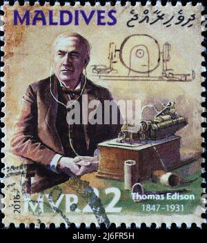 Universal stock ticker invention by thomas Edison on stamp Stock Photo ...