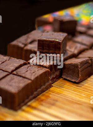 Brown chocolate cube shape candy isolated on white background Stock ...
