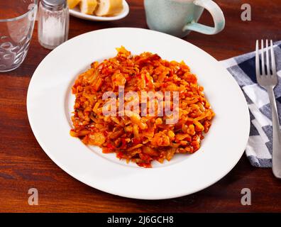 Braised white cabbage with pearl barley, carrot and onion Stock Photo ...