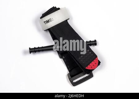 Hemostatic tourniquet on a white background top view. A tourniquet to ...
