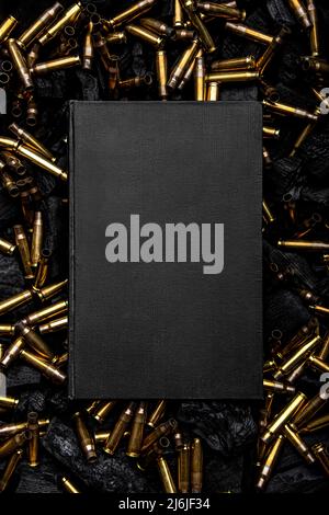 Empty rifle bullet cartridge lying on the black background Stock Photo ...