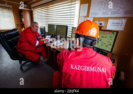 Oil refinery plant. Operational control center (control room). Operator ...