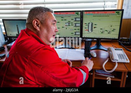 Oil refinery plant. Operational control center (control room). Operator ...