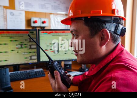 Oil refinery plant. Operational control center (control room). Operator ...