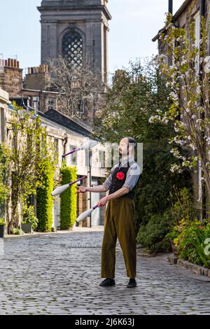 Circus act juggler, Robert Gallagher-Lyall practising juggling clubs ...