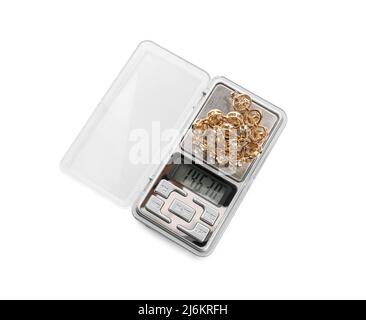 Jewelry scales with chain on white background Stock Photo - Alamy