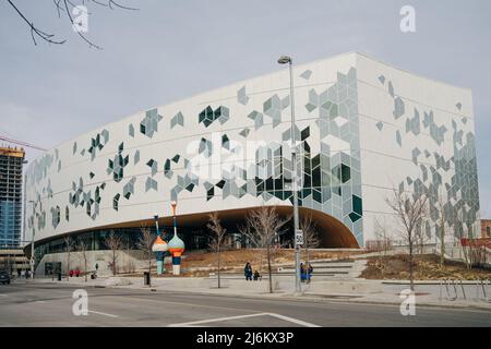 Exterior of the New Calgary Central Library. The exterior is a textured ...