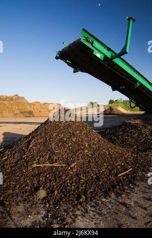 Mound of tree bark shavings in commercial sandpit Stock Photo - Alamy