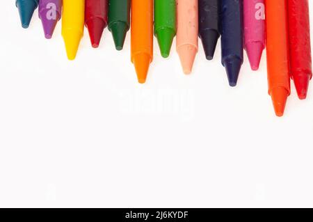 Multi colored crayons, unwrapped, no wrappers, isolated on white with ...