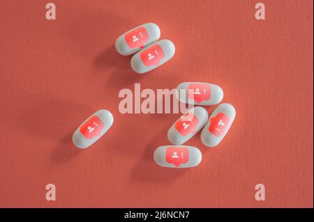 White pills with social media symbols Stock Photo - Alamy
