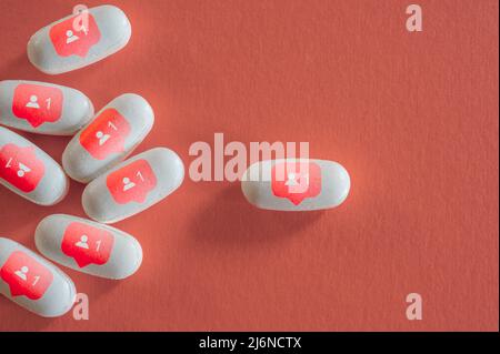 White pills with social media symbols Stock Photo - Alamy