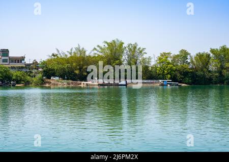 Countryside riverside scenery and sailing lighthouse Stock Photo - Alamy