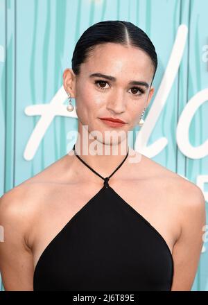 Emma Pasarow walking on the red carpet at the global premiere of "Top ...