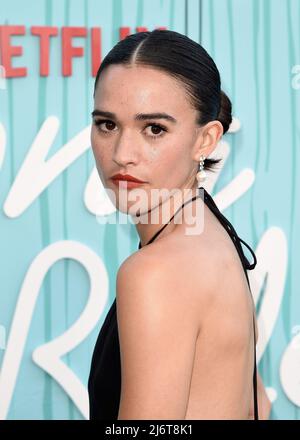 Emma Pasarow walking on the red carpet at the global premiere of "Top ...