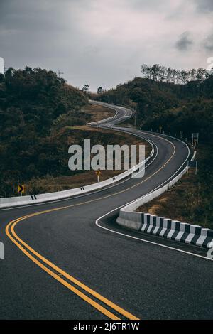 Aerial view of Curvy road number 3 in the mountain of Pua district, Nan ...