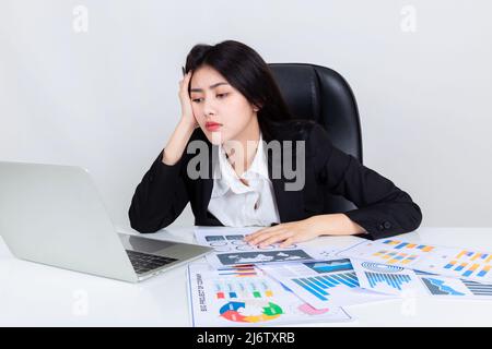 Bored work, office syndrome, Asian business woman sit at desk in office ...