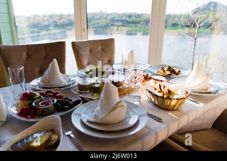 Beautiful table setting with floral decor for the holiday. Wedding ...