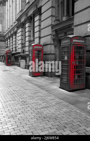 Selective colour of the Iconic red telephone boxes in Eden Place ...