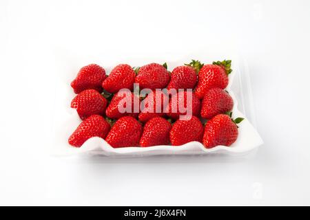 packed strawberries fruits isolated on white background Stock Photo - Alamy