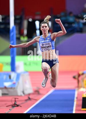 Hanna Minenko jumping at the Belgrade 2022 Indoor World Championship in the Triple jump ...