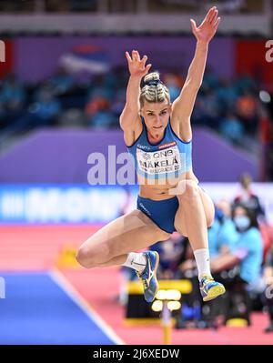 Kristina Makela jumping at the Belgrade 2022 Indoor World Championship ...