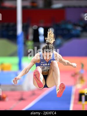 Hanna Minenko jumping at the Belgrade 2022 Indoor World Championship in ...