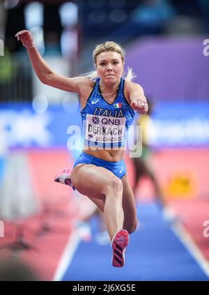 Dariya Derkach jumping at the Belgrade 2022 Indoor World Championship ...