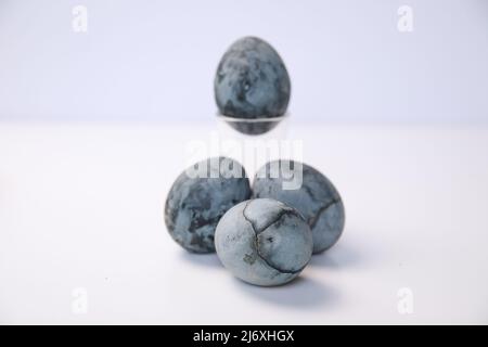 Defocus blue eggs. Close up Easter eggs pastel colored on white ...