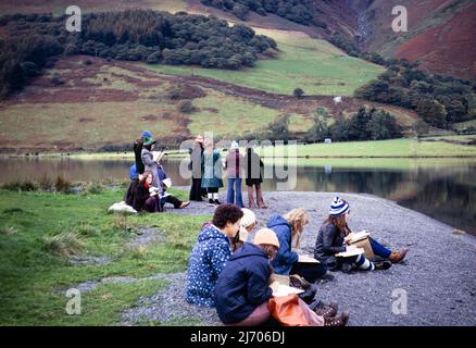 Female secondary school students engaged in geography fieldwork, UK ...