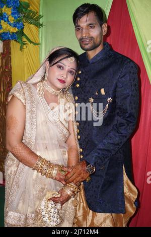 The traditional wedding of indian people is happening at the temple ...