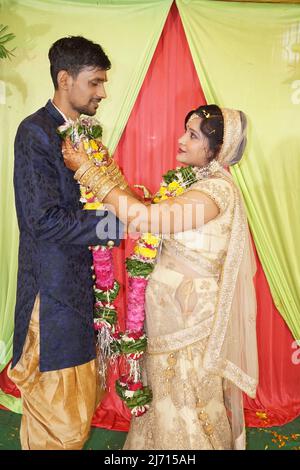 The traditional wedding of indian people is happening at the temple ...
