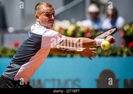 Madrid, . 05 Mai, 2022: DANIEL EVANS (GBR) returns the ball to Andrei ...