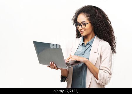 joyful african american female freelancer with coffee cup working on ...
