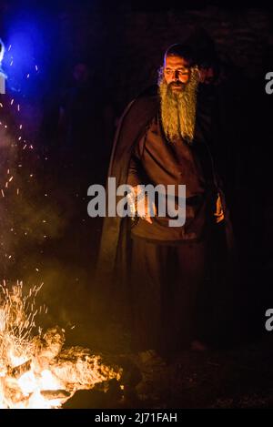 An odinist by the fire. The summer solstice is celebrated by Asatru ...