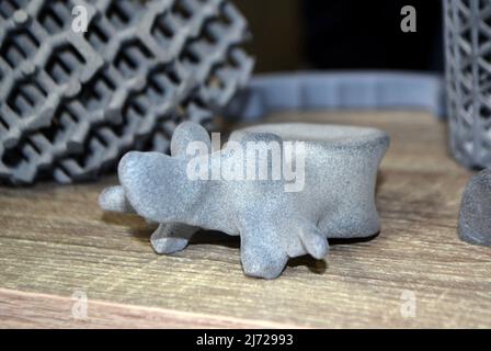Prototype human spine bone printed on 3D printer. Model printed on 3D ...