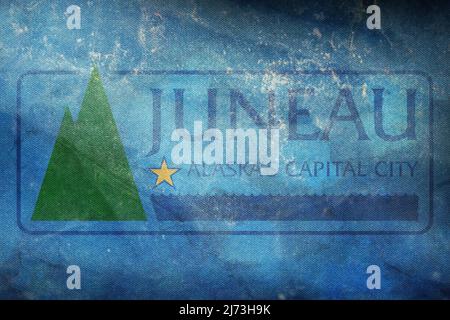 official flag of Juneau, Alaska untied states of America at cloudy sky ...