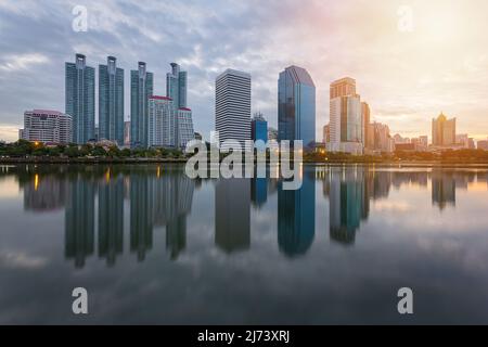 City building with water reflection before sunset background Stock ...