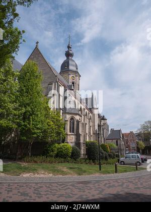 Temse, Belgium, May 1, 2020, Clock tower of the town hall on the market ...