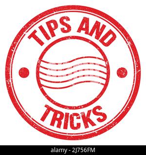 TIPS & TRICKS text written on blue round stamp sign Stock Photo - Alamy