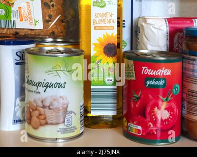 Shopping cart with long-life German groceries Stock Photo - Alamy